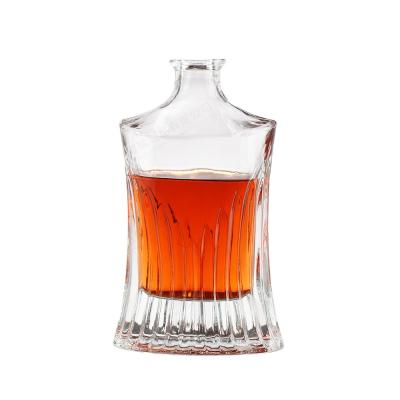 China Custom 750ml Glass Wine Bottles for Beverage Industry Luxurious and Cork Top Stripe Design for sale