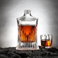 China Custom 750ml Glass Wine Bottles for Beverage Industry Luxurious and Cork Top Stripe Design for sale