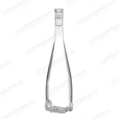 China Clear Glass Unique Floral Carving Whiskey Vodka Wine Bottle 250ml 500ml 750ml with Cap for sale