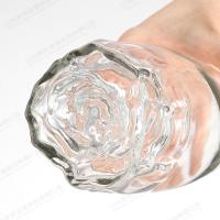 China Clear Glass Unique Floral Carving Whiskey Vodka Wine Bottle 250ml 500ml 750ml with Cap for sale