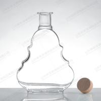China 1L Creative Glass Bottle for Alcoholic Beverages Glass Lid Custom Label Transparent for sale
