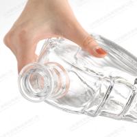 China 1L Creative Glass Bottle for Alcoholic Beverages Glass Lid Custom Label Transparent for sale