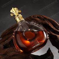 China Custom Transparent Round Empty Vodka Brandy Gin Rum Liquor Spirit Glass Bottle With Screw Cap Cork for sale
