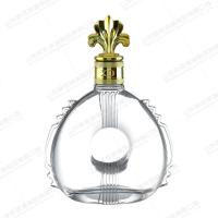 China Custom Transparent Round Empty Vodka Brandy Gin Rum Liquor Spirit Glass Bottle With Screw Cap Cork for sale