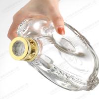 China Custom Transparent Round Empty Vodka Brandy Gin Rum Liquor Spirit Glass Bottle With Screw Cap Cork for sale