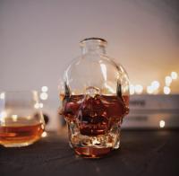 China Customized Lead-free Glass Skull Prop Whisky Bottle with Cork 700ml and Customized Logo for sale