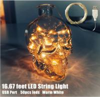 China Customized Lead-free Glass Skull Prop Whisky Bottle with Cork 700ml and Customized Logo for sale