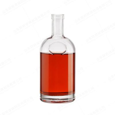 China Custom Cylindrical Clear or Frosted Whiskey Vodka Brandy Gin Rum Tequila Wine Bottle with Cork for sale