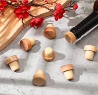 China Glass Bottle Non Spill Wood Cork Polymer Stopper With Customized Logo for sale