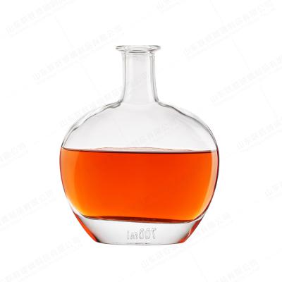 China Hot Stamping Glass Bottles for Liquor Customized 250ml 500ml Flat Round Shape for sale