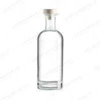 China Rubber Stopper Sealing Type Custom Logo Clear Glass Bottle for Whiskey Vodka Rum Gin T Tap for sale