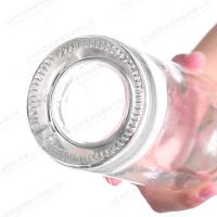 China Rubber Stopper Sealing Type Custom Logo Clear Glass Bottle for Whiskey Vodka Rum Gin T Tap for sale