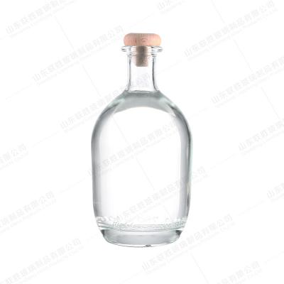 China Custom Cylinder Round Shape Wide Lip Extra Flint Glass 700ml Liquor Bottle with Cork for sale