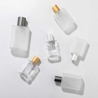 China 10ml 50ml 60ml 100ml Luxury Transparent and Frosted Perfume Glass Bottle with Lids for sale