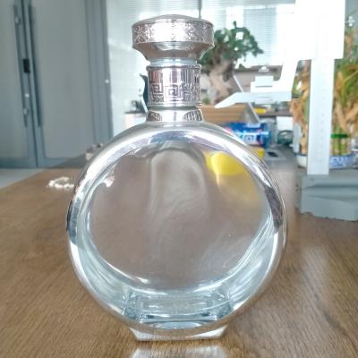 China Clear Glass Custom Electroplated Gold Gin Champagne Liquor Vodka Bottle With Cork Cap for sale
