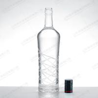 China 500ml 700ml 750ml Round Engraved Glass Bottle with Screw Cap for Vodka Gin Whisky for sale
