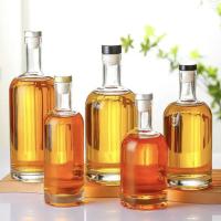 China 250ml Round Boston Glass Wine Bottle 8oz Vodka Bottle With Cork Lid for sale