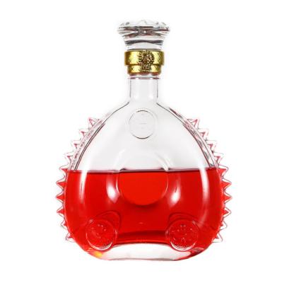 China Luxury Clear 700ml Whisky Glass Bottle with Cap Unique Shaped XO Wine Glass Bottle for sale
