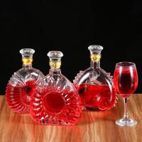 China Luxury Clear 700ml Whisky Glass Bottle with Cap Unique Shaped XO Wine Glass Bottle for sale