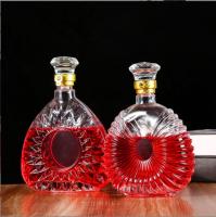 China Luxury Clear 700ml Whisky Glass Bottle with Cap Unique Shaped XO Wine Glass Bottle for sale