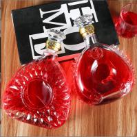 China Luxury Clear 700ml Whisky Glass Bottle with Cap Unique Shaped XO Wine Glass Bottle for sale