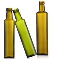 China Body Material Glass Olive Oil Bottle Dark Green Round Oil Glass Bottle with Metal Lid for sale