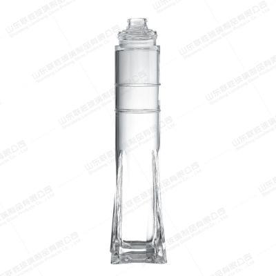 China Unique Design Glass Bottle Custom Capacity Logo for Champagne Whiskey Brandy Wine Spirits for sale
