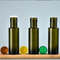 China Customized Olive Green Glass Essential Oil Bottle 50ml/100ml Luxury Cooking Oil Bottle for sale