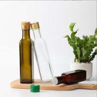 China Glass Collar Clear 500ml 750ml Dark Green Round Marasca Cooking Oil Bottle With Lid for sale