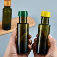 China Industrial Green Brown Round Olive Oil Glass Bottles with Rubber Stopper Sealing Type for sale