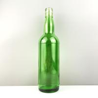 China Body Material Glass 750ml Clear Round Olive Oil Bottle for Dispensing and Storage for sale