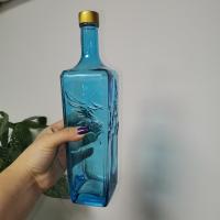 China 500ml 750ml 700ml 1l Transparent Blue Sky Ocean Color Spirit Glass Bottle for sale