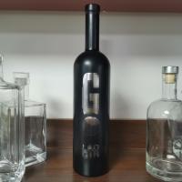 China Custom 250ml 500ml 700ml 750ml Matte Black Color Round Long Neck Spirit Glass Bottle for sale