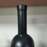 China Custom 250ml 500ml 700ml 750ml Matte Black Color Round Long Neck Spirit Glass Bottle for sale