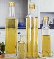 China Clear Round Glass Olive Oil Bottle for Cooking Matte Surface Handling 100ml 200ml 300ml for sale