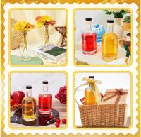 China Acceptable Customer's Logo Clear Glass Bottle for Gin and Whisky 12 oz Customied Color for sale