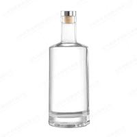 China ODM 500ml 700ml 750ml Round Liquor Glass Bottle With T Sealing Cork for sale