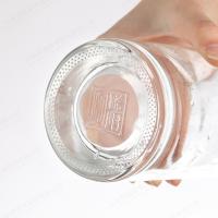 China ODM 500ml 700ml 750ml Round Liquor Glass Bottle With T Sealing Cork for sale