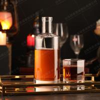 China ODM 500ml 700ml 750ml Round Liquor Glass Bottle With T Sealing Cork for sale