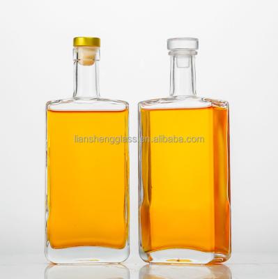 China Wine 200ml Transparent Round Empty Flint Glass Liquor Bottle With Sealed Cork Lid for sale