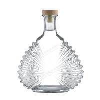 China Clear Glass Bottle with Cork 750ml 1000ml Flat Carved Artistic Base Material Glass for sale