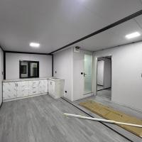 China Wood Grain Waterproof Expandable Prefab Container House for Forest Lakeside Glamping Homestay for sale