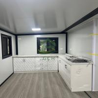 China Black Wall Panel Two Story Expandable Container House With Terrace And Canopy for sale