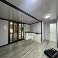 China 20ft Expandable Container Home 38.2sqm Red Wooden Color Black Frame Hydraulic Expansion System for sale