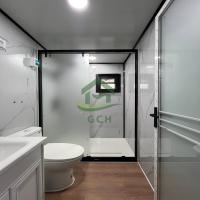 China Brick Color Wall Panel And Black Frame Expandable Container House With Kitchen And Wooden Floor for sale