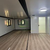 China Brick Color Wall Panel And Black Frame Expandable Container House With Kitchen And Wooden Floor for sale