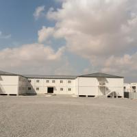 China Typhoon Resistant Flat Pack Office Building 20ft Emergency Relief Shelter for sale