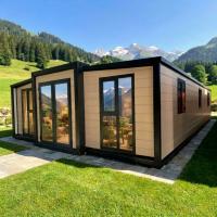 China 20ft Expandable Container Home 38.2sqm Pink Panel Black Frame with Bathroom for sale