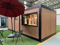 China 10ft Expandable Container House Luxury Folding Villa 20m² with Wood Grain Metal Cladding for sale