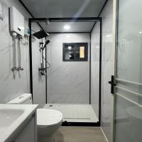 China Modern Luxury Tiny House 10FT- 40FT Container Home Expandable With Stone Exterior for sale